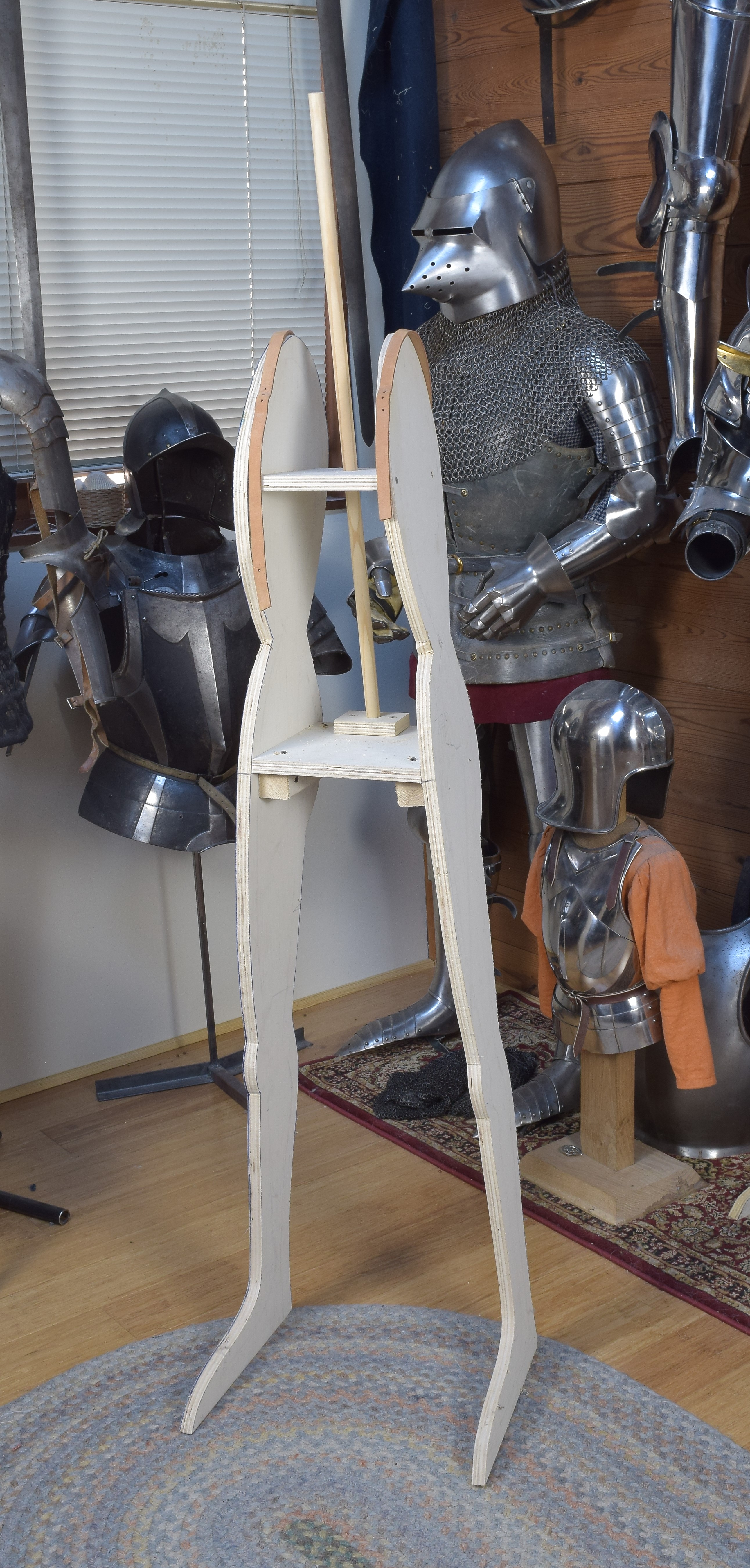 Different static plywood stands for armor
